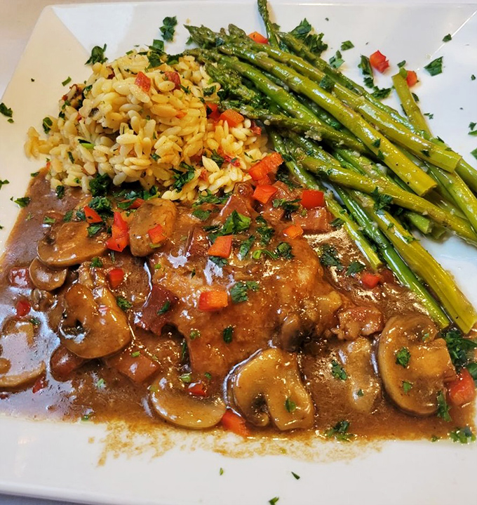 Veal Marsala with mushrooms so flavorful they make you wonder if they've been taking umami enhancement classes.