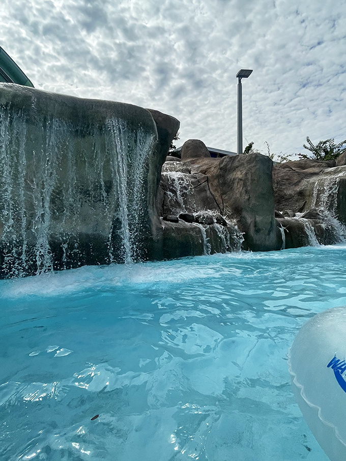 Artificial falls create a tropical paradise vibe, proving that sometimes the best natural wonders are the ones engineered for maximum fun.