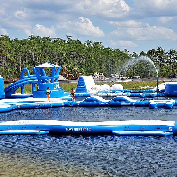 Bouncing, sliding, and splashing on the inflatable water course – where "I'll just watch" quickly becomes "My turn next!"