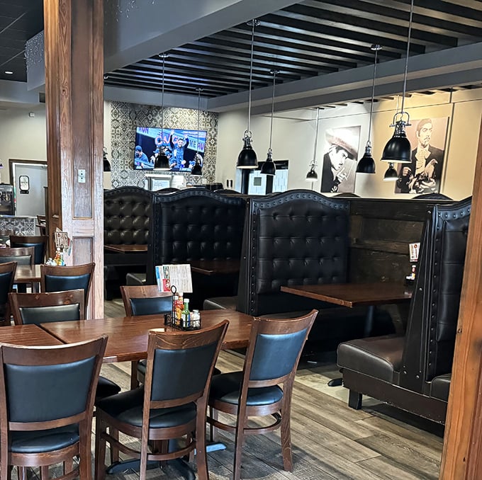 High-backed booths and thoughtful lighting create intimate dining spaces where you can actually hear your dinner companions without shouting like you're at a concert.