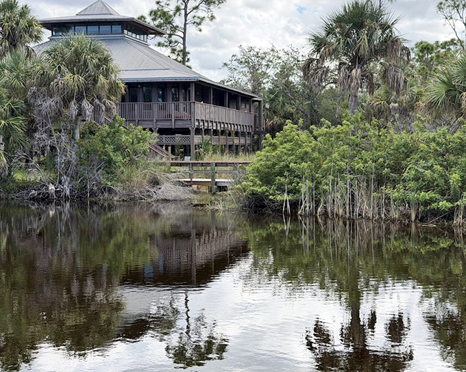 The visitor center reflects in still waters, creating nature's perfect selfie without the need for filters.