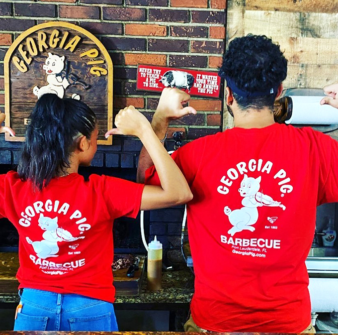 Staff showing their Georgia Pig pride. When your workplace has survived decades in the restaurant business, those shirts are badges of honor.