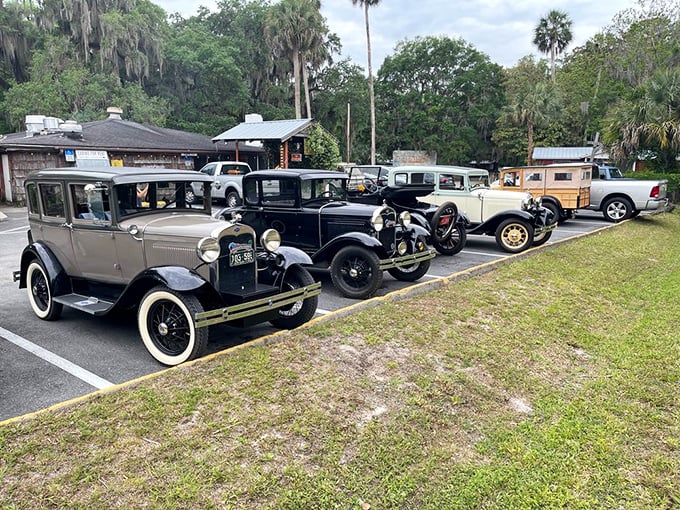 Vintage cars occasionally line the parking area, a fitting prelude to the time travel experience awaiting inside this Old Florida institution.