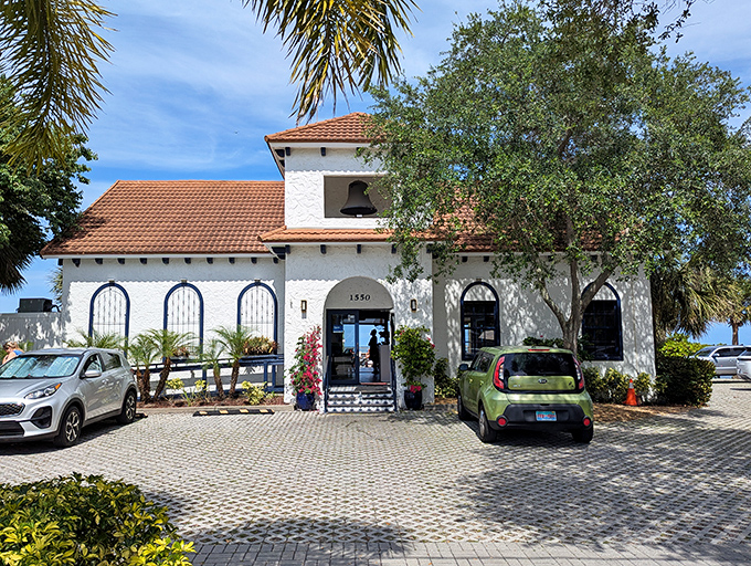 Mediterranean-inspired architecture houses seafood treasures within, its white walls and terracotta roof creating an inviting coastal landmark.