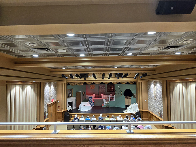 From above, the stage becomes a canvas of possibility, where lighting transforms simple spaces into extraordinary worlds.