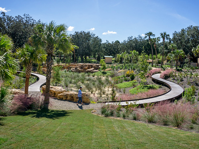 Curved walkways invite leisurely exploration through native landscapes, where getting lost is half the fun and entirely the point.