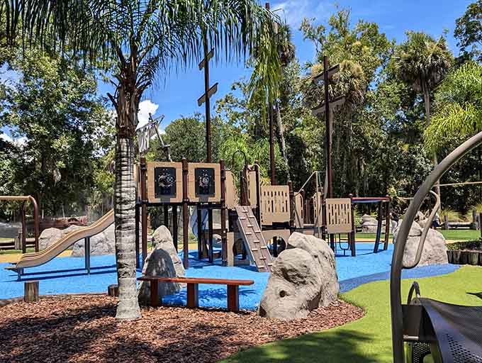 Modern playground equipment promises hours of entertainment, giving kids their own adventures while butterflies get theirs.