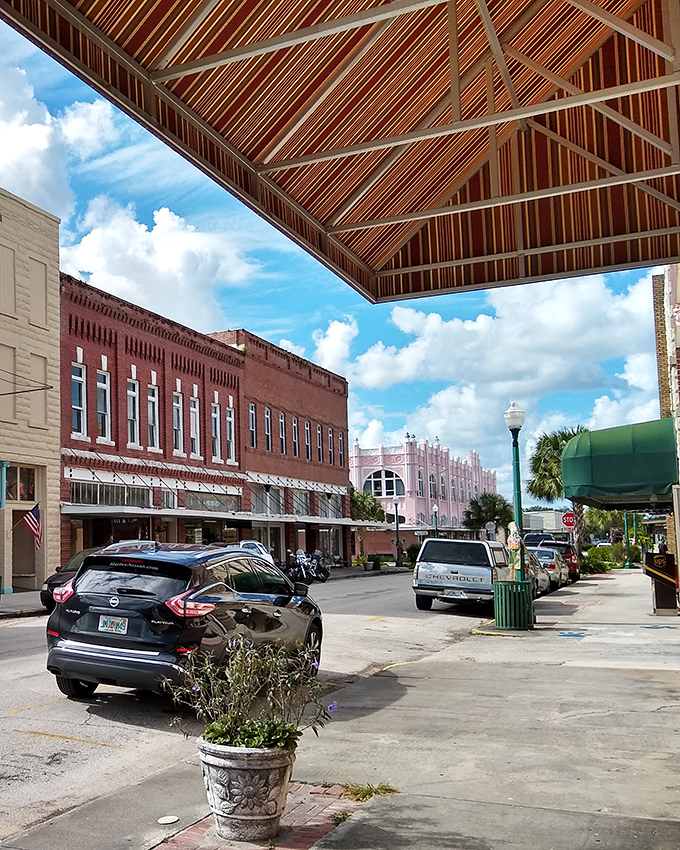 Awnings provide welcome shade in downtown Arcadia, where brick streets and historic architecture create the perfect backdrop for unhurried afternoon strolls.