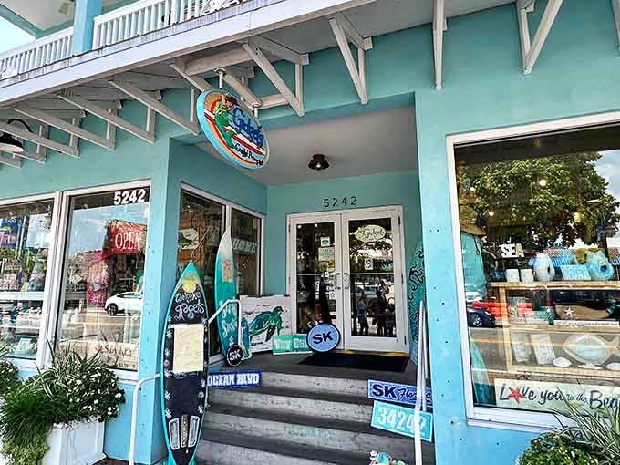 Gidget's Coastal Provisions captures beachside living in its aqua-blue facade, where surfboards aren't just transportation but decoration too.
