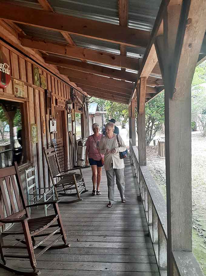 Enjoy a relaxing stroll along the shaded wooden porch, where rocking chairs wait for you to sit and stay awhile.