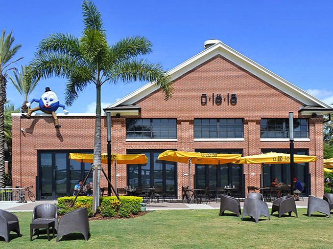 Humpty Dumpty surveys his kingdom from atop Ulele's brick building, safely secured against any great falls.