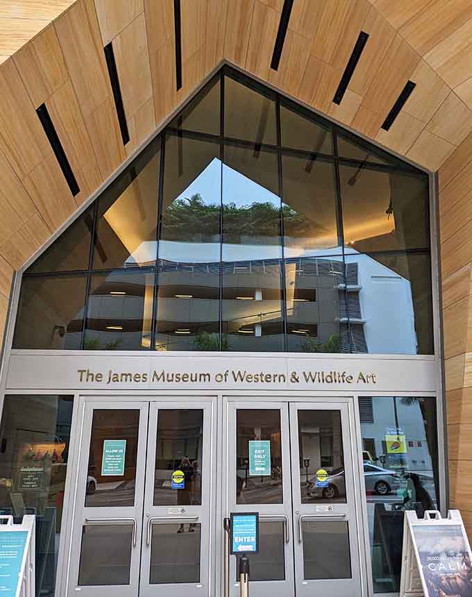 The entrance beckons visitors inside with modern design that hints at the treasures waiting within those doors.