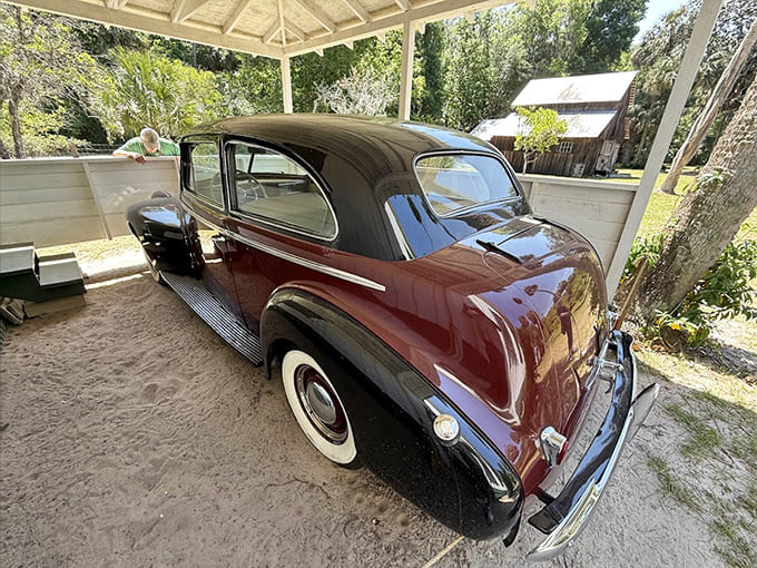 Even the vintage automobile feels like a character from her stories, perfectly preserved and ready for a drive to town.