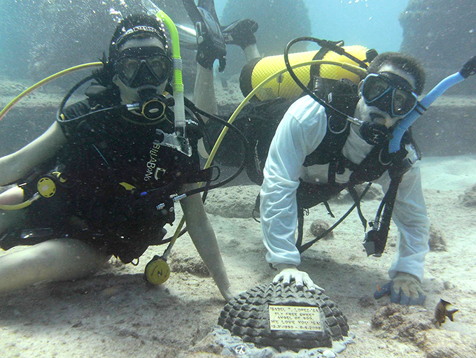 Placing a memorial becomes a profound underwater ceremony&mdash;a final dive that transforms grief into contribution as loved ones become part of the reef.