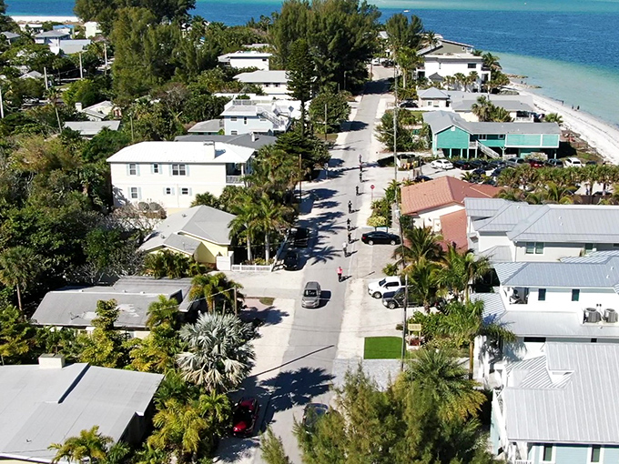 Old Florida charm preserved in pastel perfection, where no building dares to be taller than the tallest palm tree.