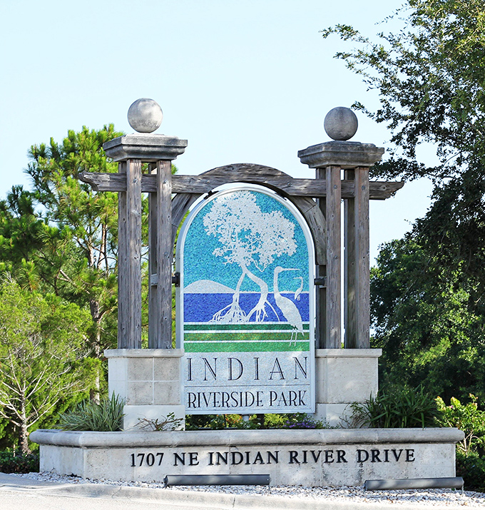 The park's welcoming entrance sign features a stylized mangrove tree, immediately signaling the natural treasures waiting just beyond the gates.