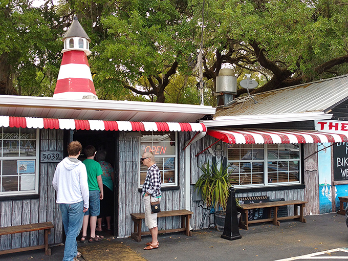 The Great Catch's weathered exterior and lighthouse-topped roof signal authentic seafood inside &ndash; where grouper sandwiches reign supreme.