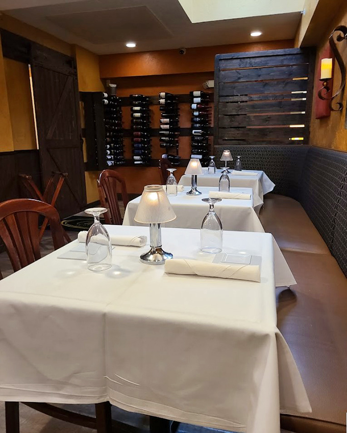 White tablecloths and warm lighting create the perfect stage where Italian culinary traditions perform their greatest hits nightly.