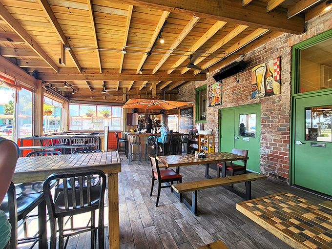 Sunshine filters through this cheerful orange sanctuary where indoor comfort meets outdoor vibes in perfect harmony.