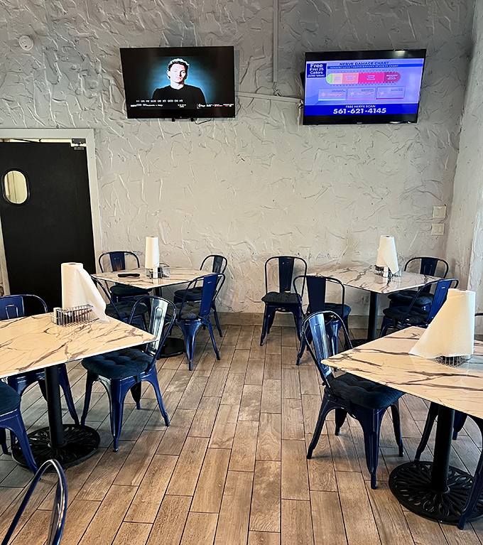 Minimalist charm with maximum comfort, these tables await the clatter of crab mallets and the laughter of satisfied diners.