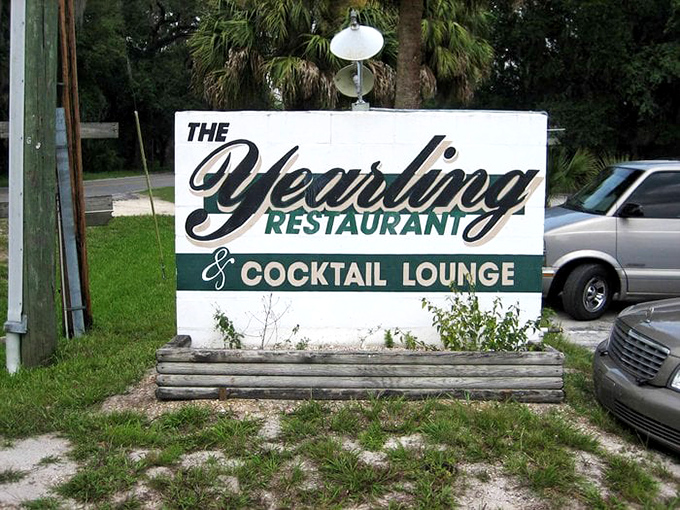 The weathered sign stands as a sentinel, promising "cocktails" alongside dinner &ndash; a combination that has lured hungry travelers for decades.