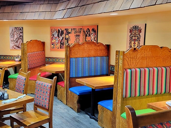 Colorful booths and authentic artwork create dining nooks that feel both festive and intimate &ndash; your own little corner of Mexico-meets-Cuba.