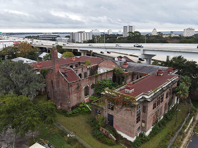 The building sits like an island of history surrounded by modern development, stubbornly refusing to disappear despite the changing world around it.
