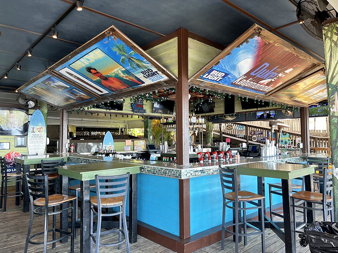 A bar that channels surf shack vibes with colorful signage and enough rum bottles to make you wonder if Captain Jack Sparrow is the silent partner.