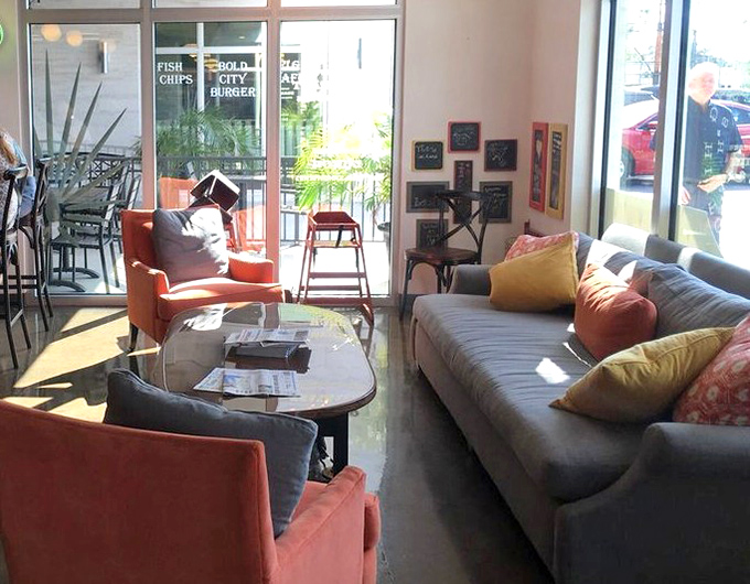 The lounge area invites you to sink into cushions while sinking your teeth into something delicious &ndash; comfort squared in every sense.