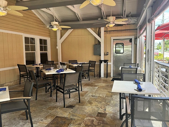 A breezy sanctuary where ceiling fans lazily stir the air, perfect for those "not quite ready for full sun" moments.