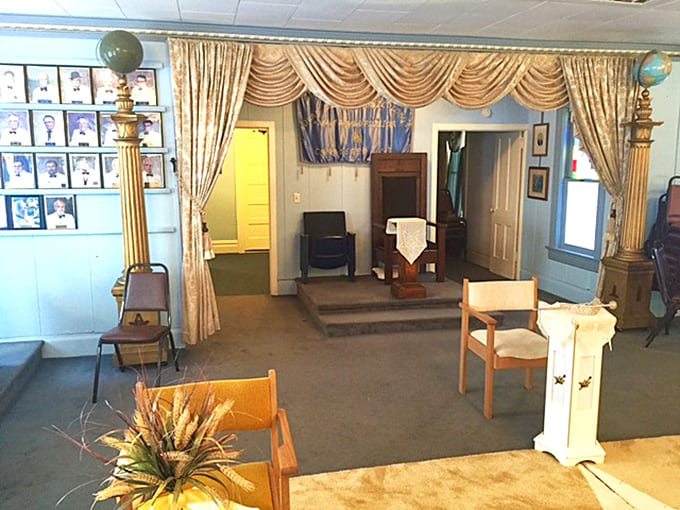 The reception hall welcomes visitors with Victorian elegance, though the welcoming committee sometimes includes members not listed on any official roster.