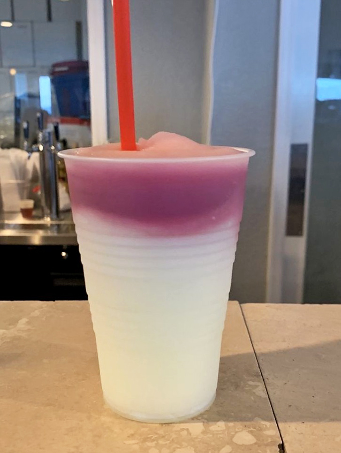 The L-Bomb slushie &ndash; a layered masterpiece of colors that tastes like summer and photographs like a tropical dream.