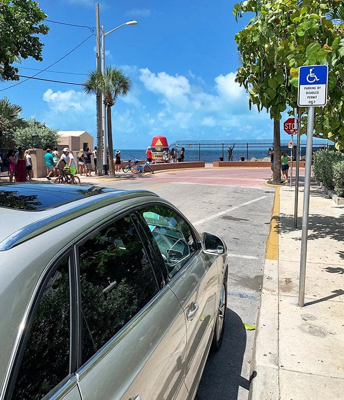 The street view reveals how close this famous landmark sits to everyday Key West life, where geography and neighborhood peacefully coexist.