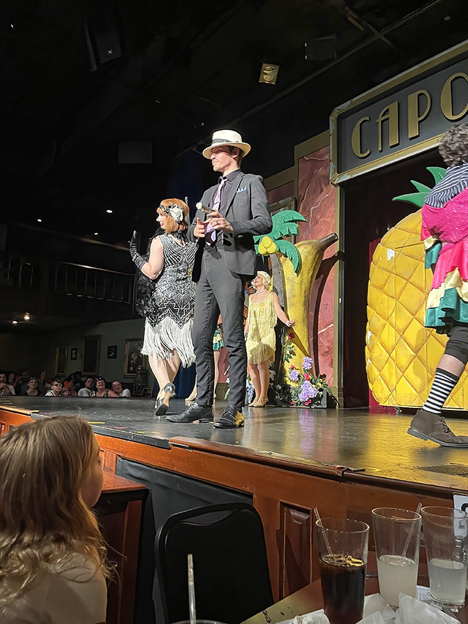 Performers bring the Roaring Twenties to life with period costumes and high-energy routines that capture the era's rebellious spirit.