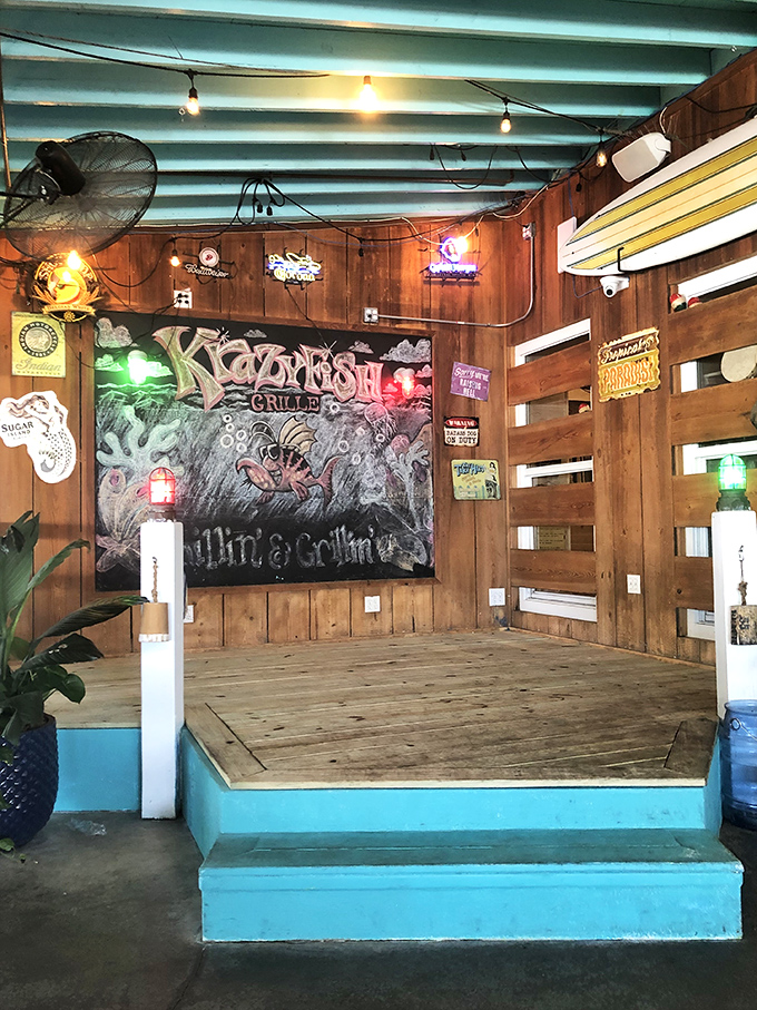 This cozy corner transforms into the heart of the party when local musicians arrive, proving food tastes better with a soundtrack.