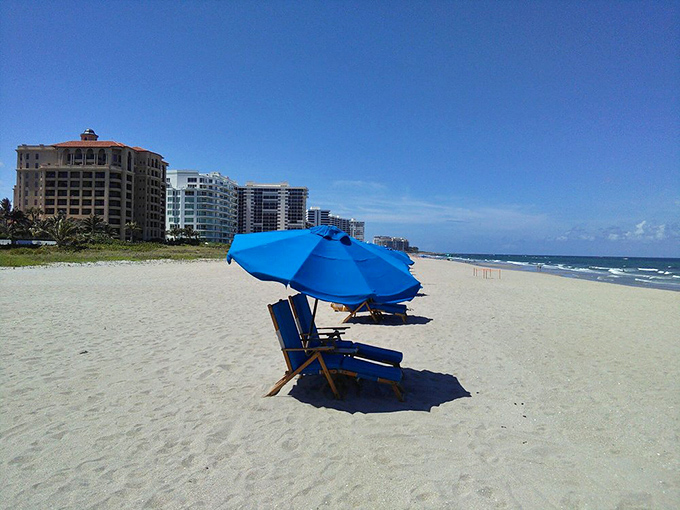 Empty chairs await beach-goers like an invitation written in sand and sunshine &ndash; "Come, sit, forget your troubles."