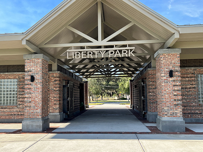 The Liberty Park entrance pavilion welcomes visitors with architectural charm, standing as a gateway to outdoor enjoyment.
