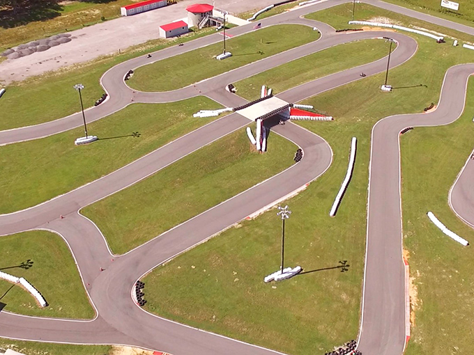 From above, Bushnell's track reveals itself as a twisted ribbon of asphalt promise, each turn offering a new challenge to master.