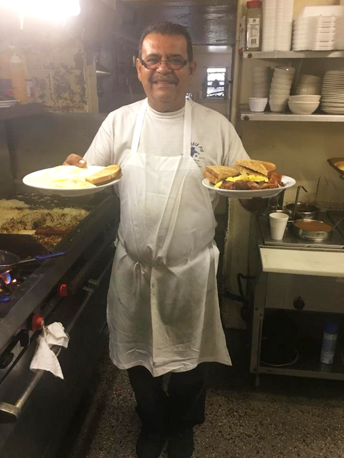The hands that feed Fort Lauderdale's barbecue obsession. That smile says, "I know something delicious that you're about to discover."