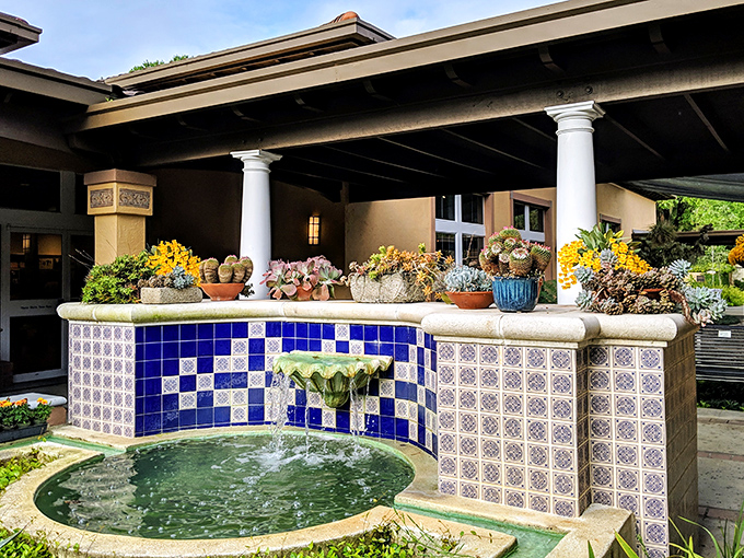 Blue and white tiles frame a bubbling fountain, bringing a touch of Mediterranean charm to central Florida's rolling hills.