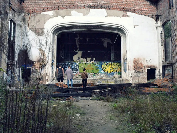 Even from outside the fence, visitors find themselves drawn to this architectural time capsule, proof that decay can be as compelling as preservation.