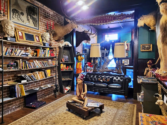 An interior that asks "what if a Victorian naturalist's study had a baby with a gothic cathedral?"