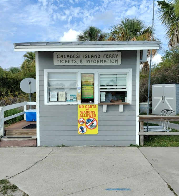 Ferry Ticket Booth Entrance: The humble gateway to island magic &ndash; where everyday worries are exchanged for adventure tickets.