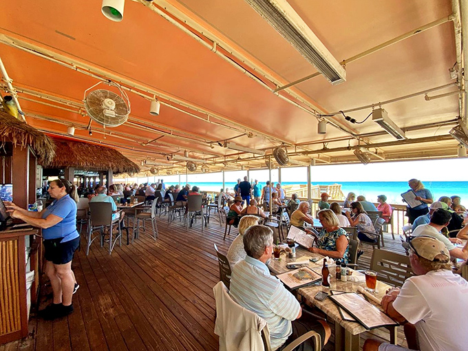 Shuckers' outdoor deck fills with happy diners soaking up sunshine, sea breezes, and fresh seafood simultaneously.