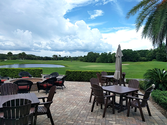The patio offers front-row seats to golfing drama, where cold beverages and comfortable chairs turn spectating into an art form.
