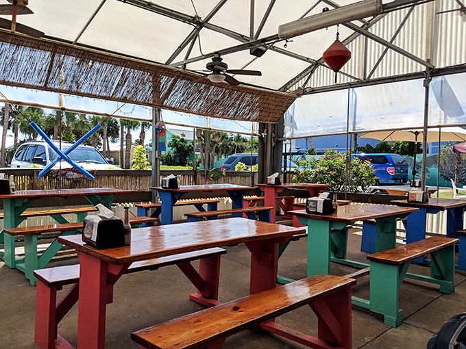 Soak up the Florida sun on the Boondocks patio! Grab a colorful bench and enjoy the perfect Port Orange outdoor dining experience.