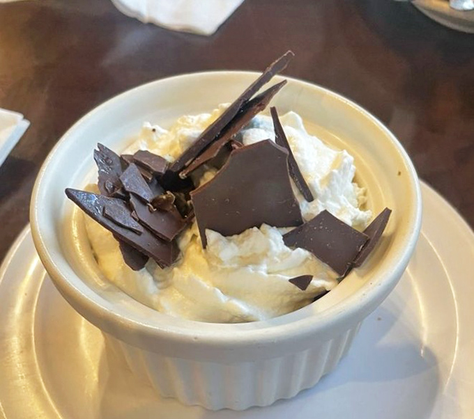 Chocolate that's achieved its final, most glorious form &ndash; topped with cream and shards for textural intrigue.