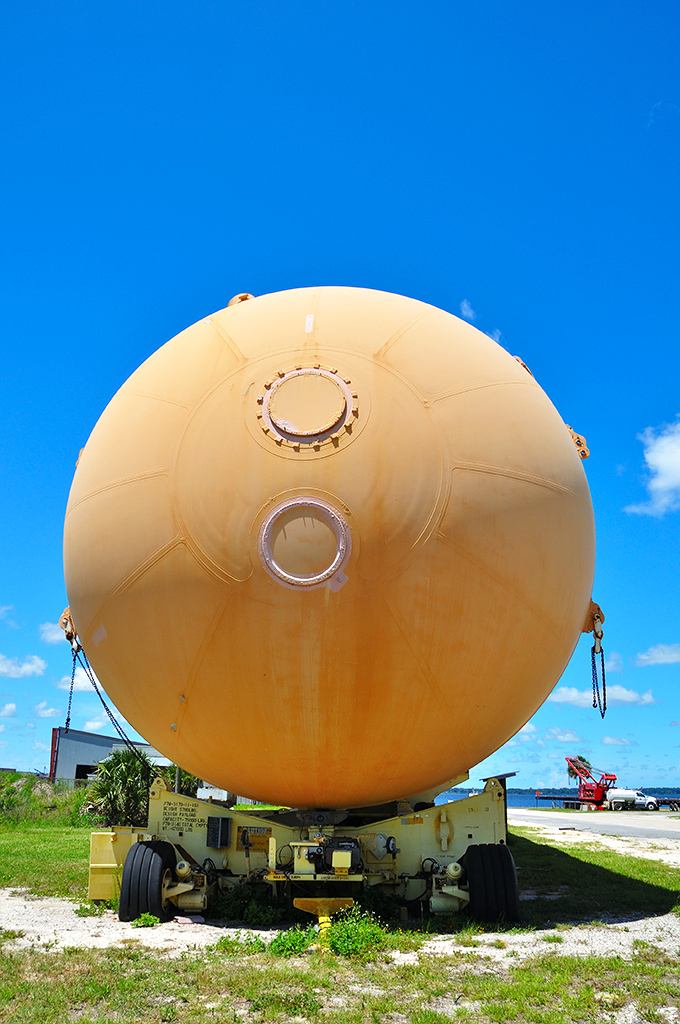 Engineering meets art in this end-on view. The circular face with its mysterious ports and hatches resembles some ancient cosmic medallion.