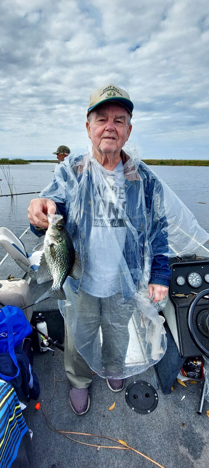 That smile says everything: a successful day fishing beats scrolling through social media every single time.