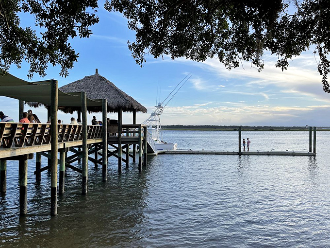 The dock at Cap's isn't just for boats – it's a front-row seat to nature's daily performance of water, sky and wildlife.